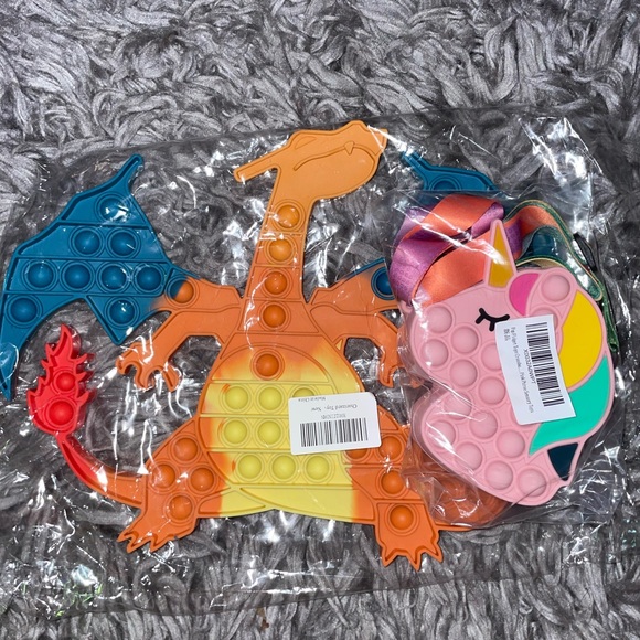 Toys | Pop Its Large Charizard Pokmon And Unicorn Purse With Sash And ...